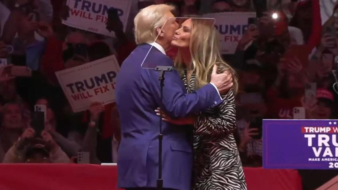 What a cheek! - Melania's awkward smooch for Donald in surprise ...