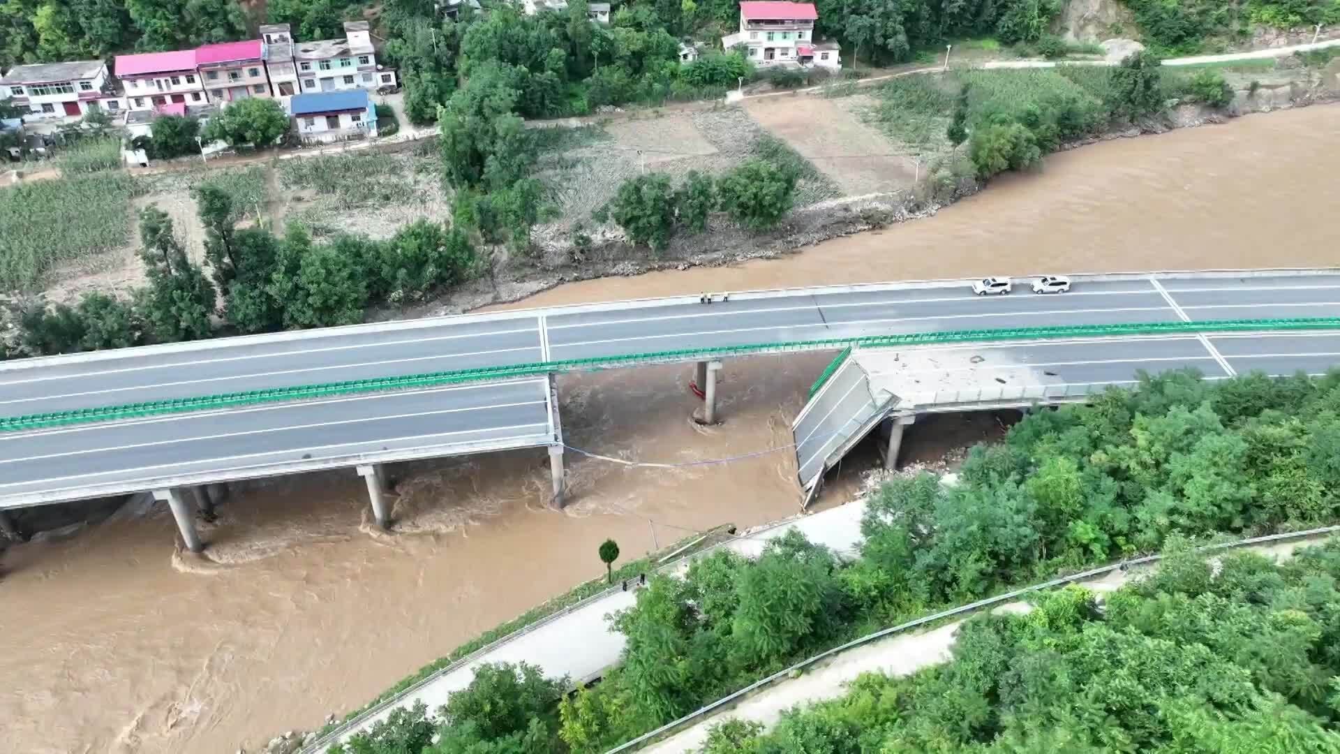 11 dead, dozens missing following partial bridge's collapse in Shaanxi as severe storms and ...