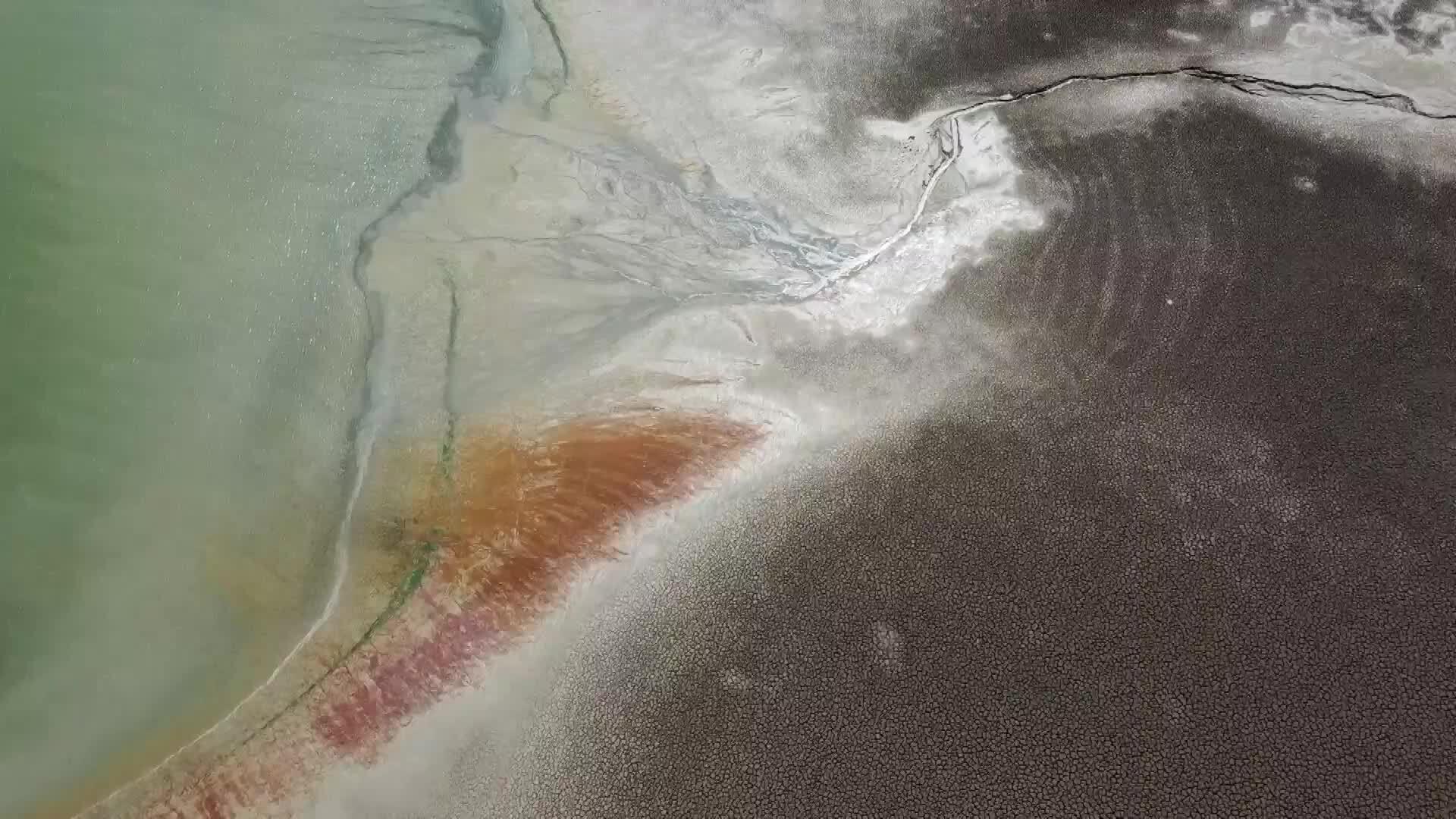 Drained and cracked! Drone footage shows Sicily's Lake Fanaco almost ...