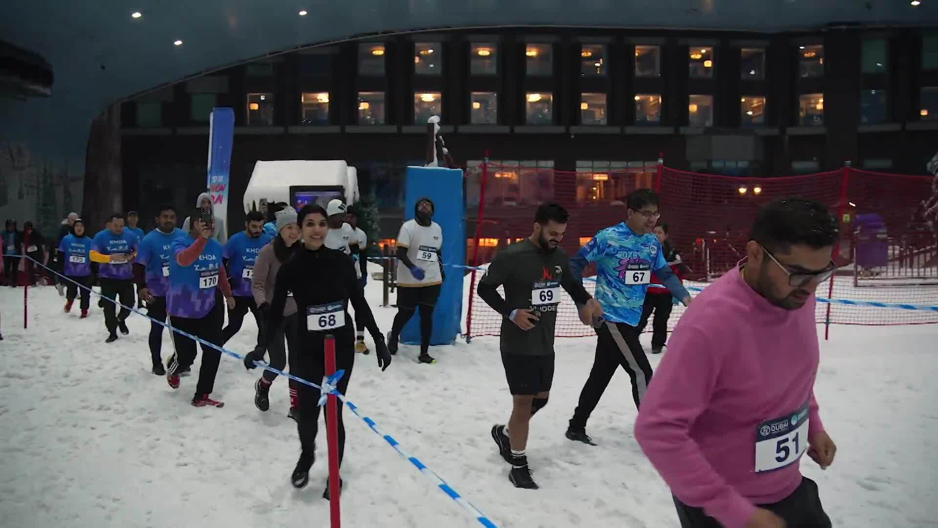 Icy does it! 600 runners dash for the finish line as annual 'Snow Run ...