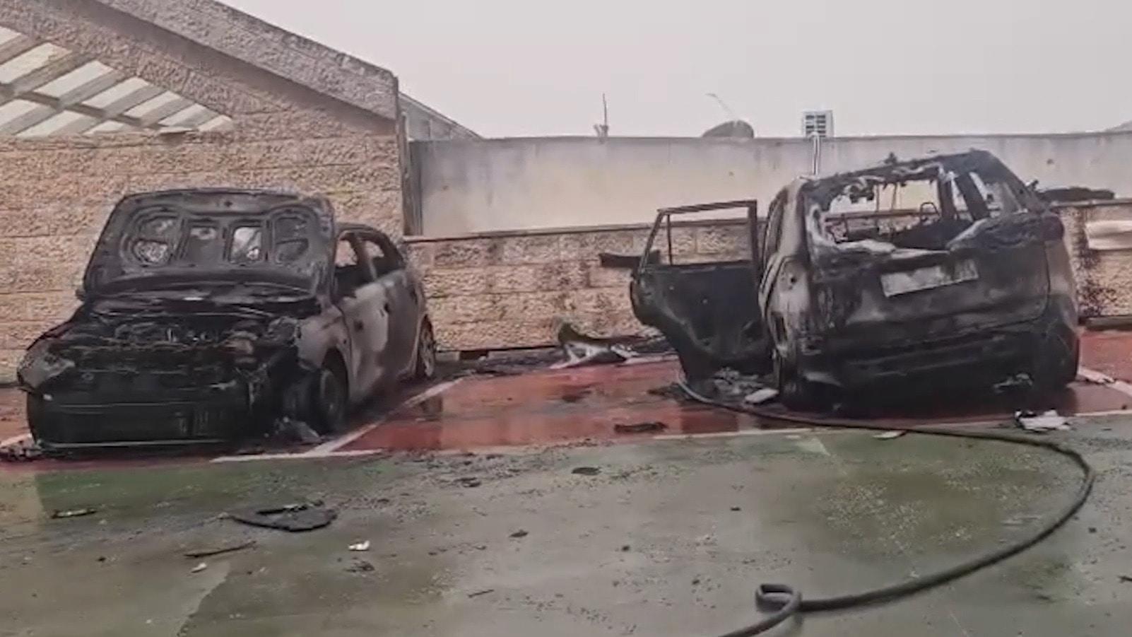 Fallout in Kiryat Ata - Fire and rescue crews inspect charred cars ...
