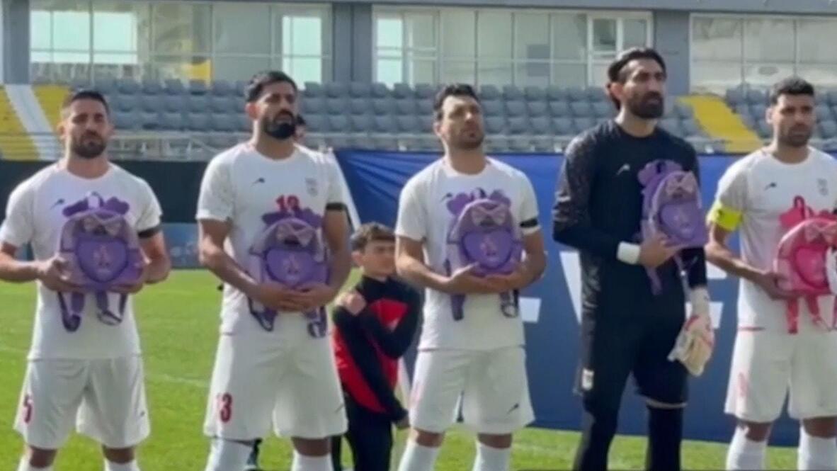 Pink and purple protest - Iran's national team players carry backpacks ...