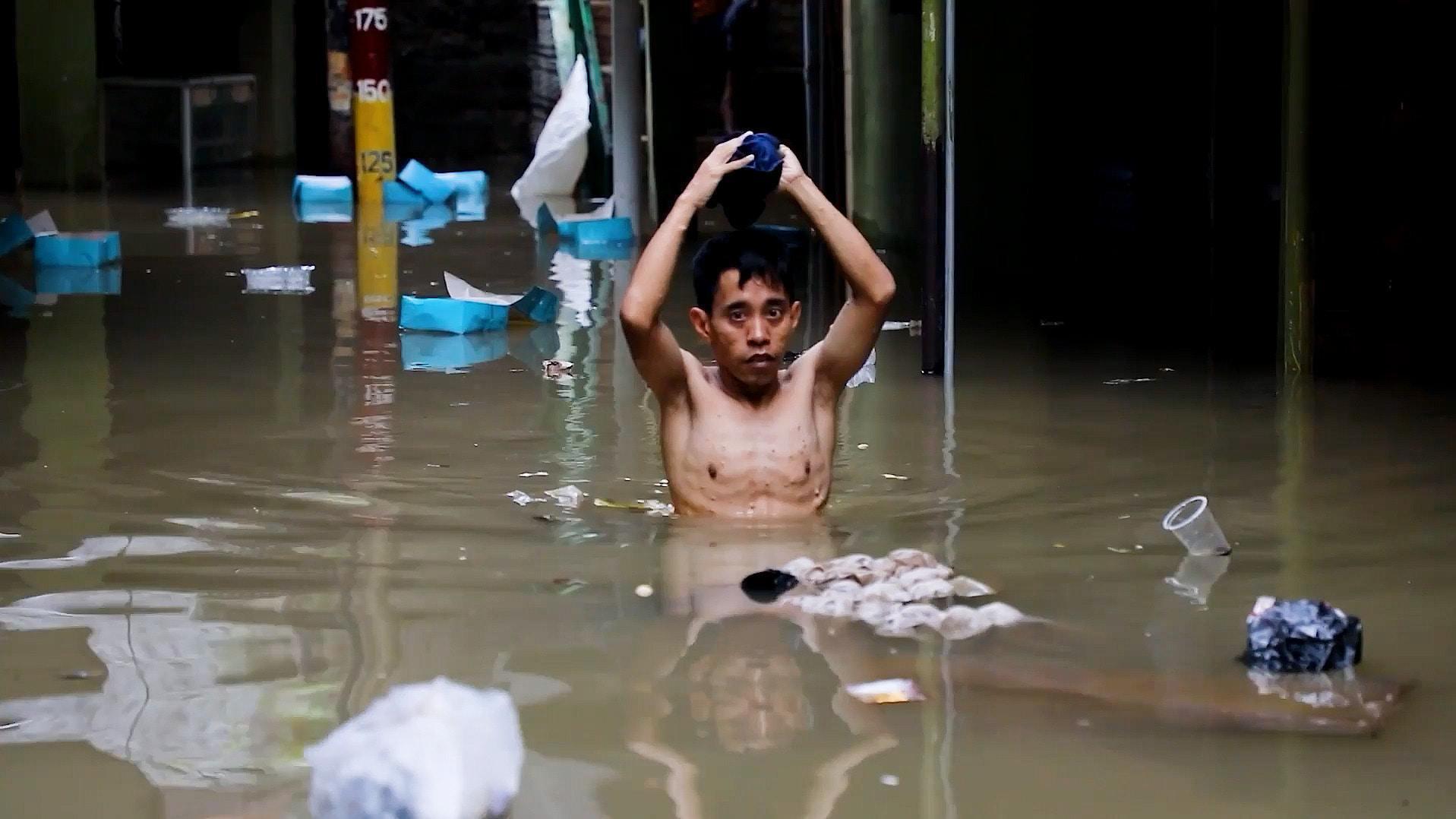 'Levels up to two meters' - Homes submerged across Jakarta as heavy ...
