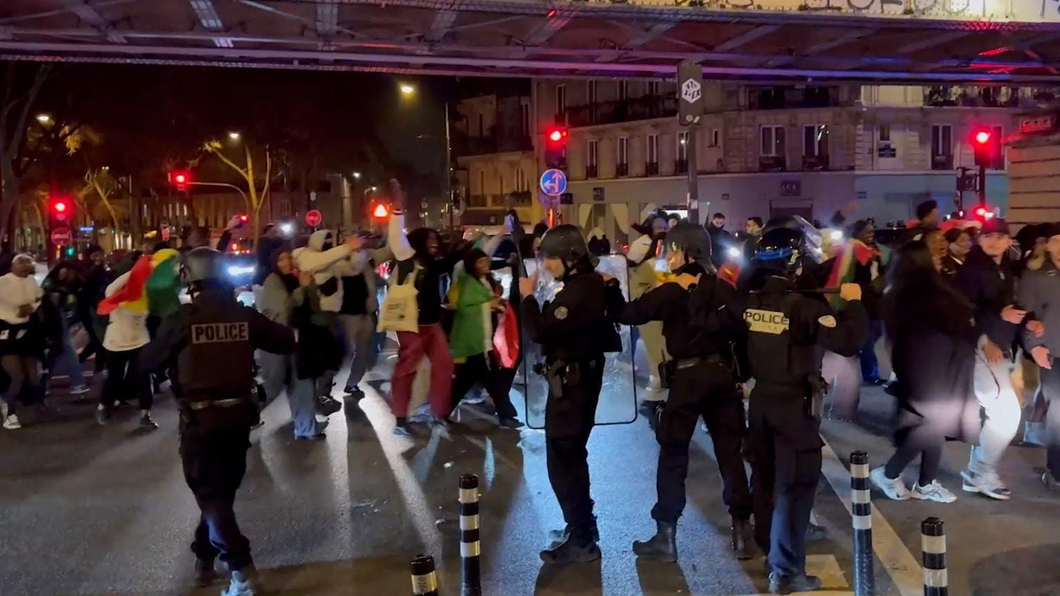 Chaos in Paris - Police disperse Senegal fans as AFCON victory ...