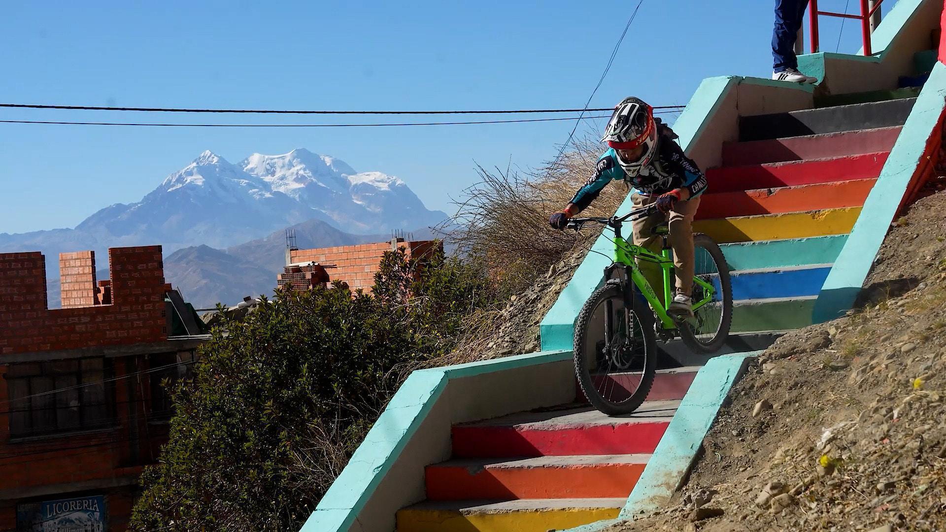 Cycling on the edge! Athletes take on 'world's longest' downhill bike ...