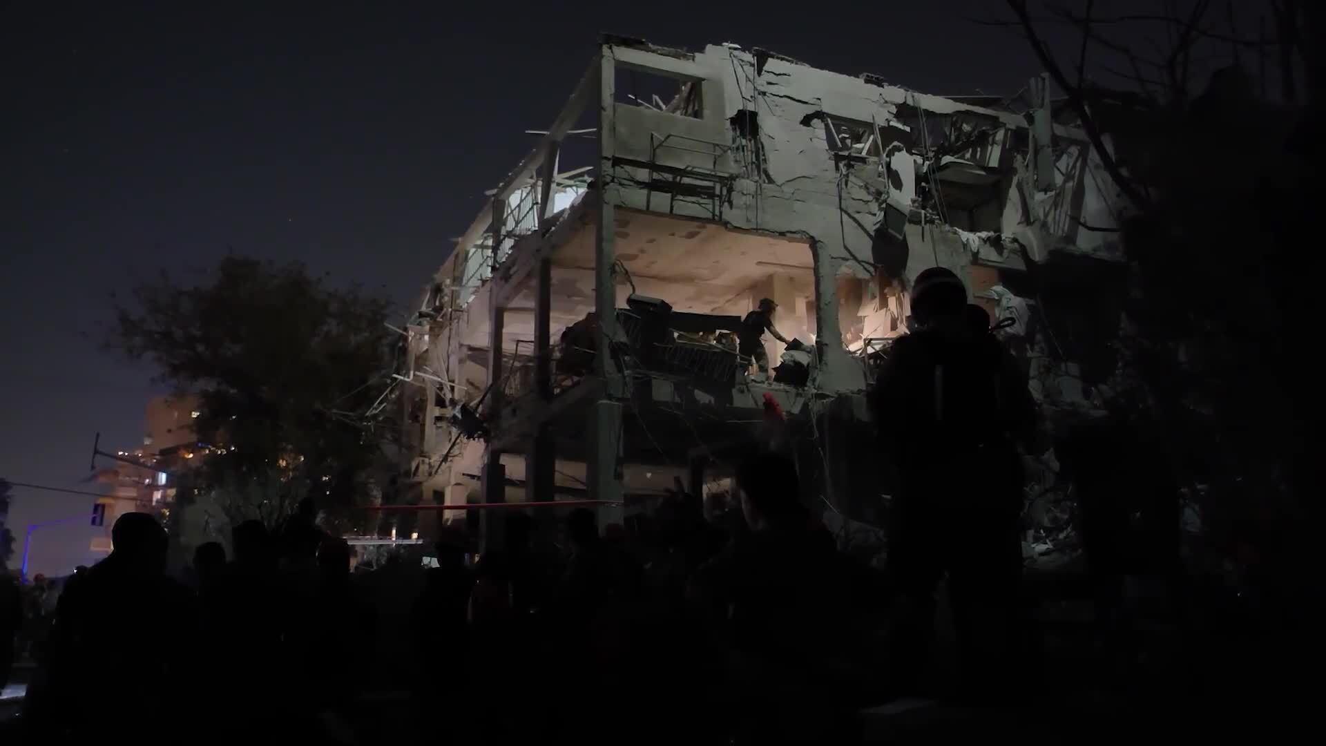 Tel Aviv under fire - Crews survey damage in aftermath of Iranian ...
