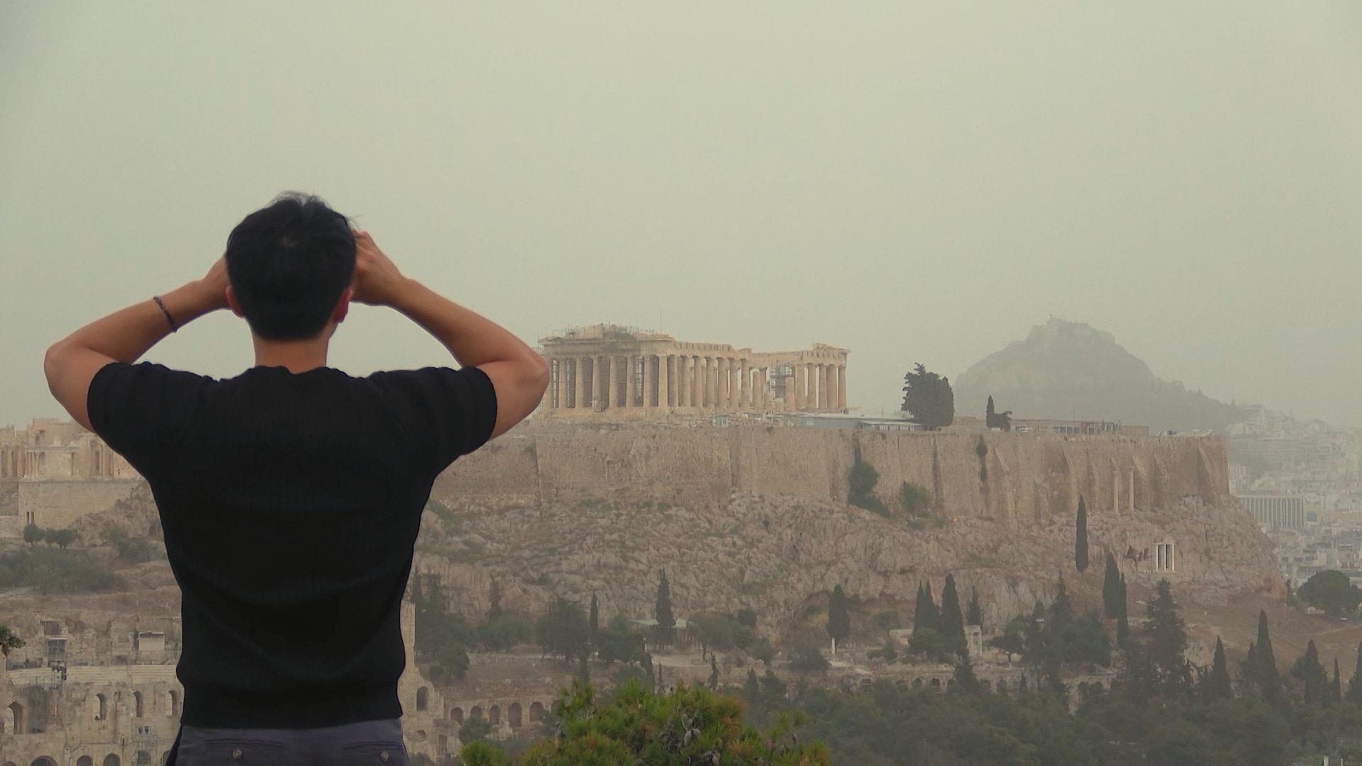 History in haze! Iconic Athens landmarks cloaked as Saharan dust storm ...