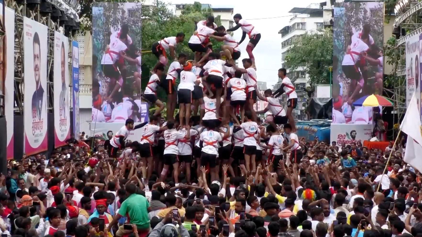 Balancing act - Human pyramids and sky-high spirits mark birth of Lord ...