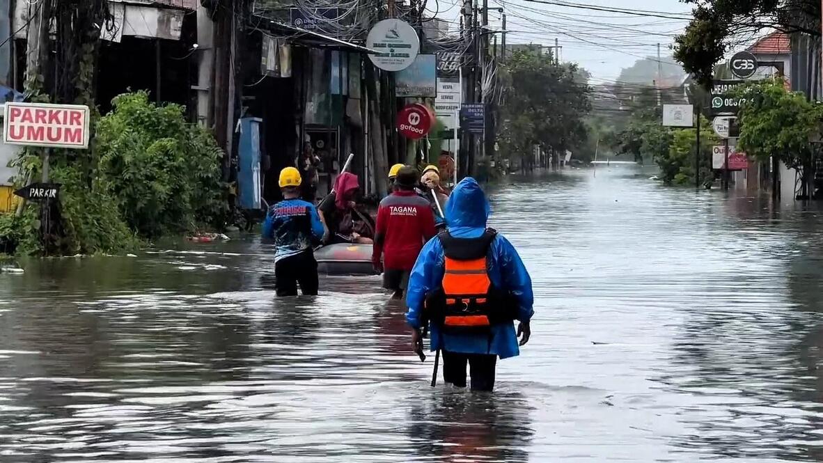 Knee-deep floodwaters - Severe rainfall hits Bali's Badung Regency ...