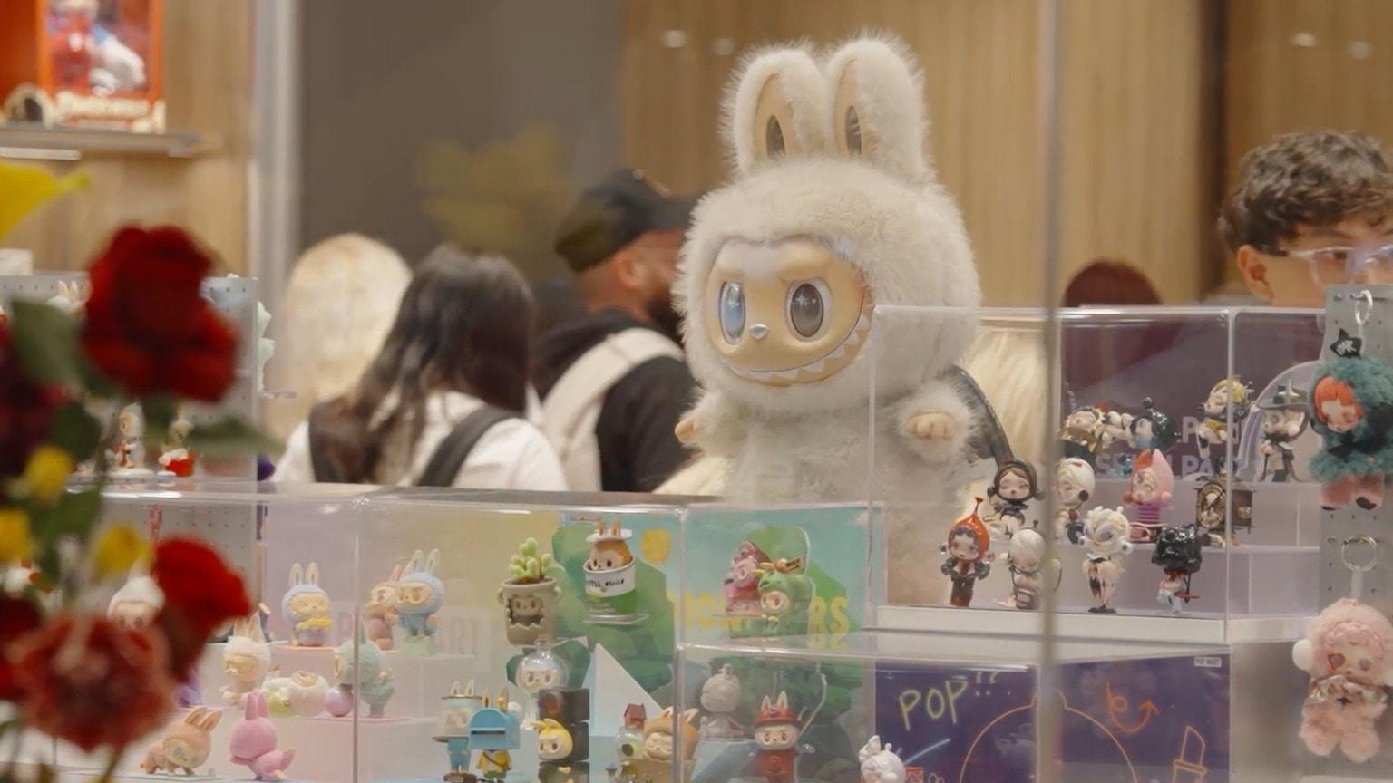 Sweet but psycho! Labubu fans queue in their hundreds as first shop ...