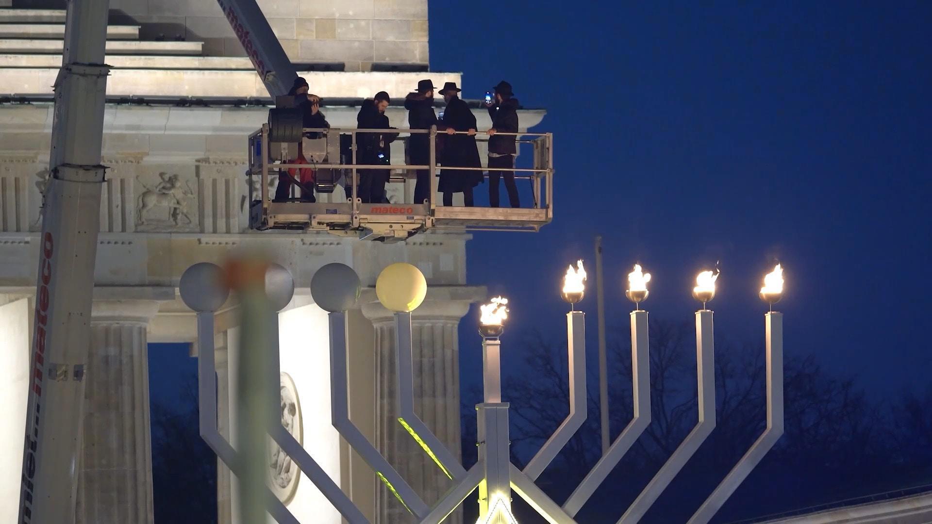 Heightened security - Berlin's iconic menorah illuminated under extra ...