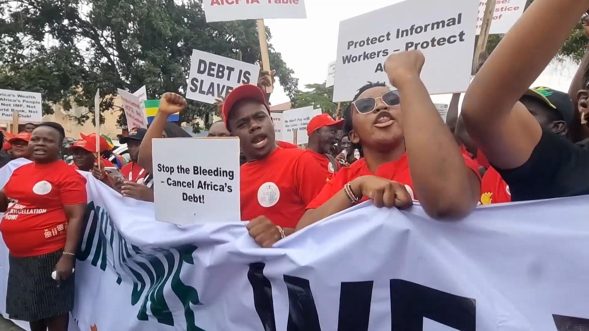 'Drop the debt, Africa can't breathe!' - Hundreds rally in Accra for ...
