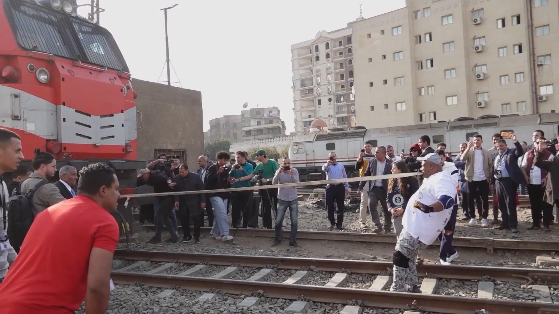 Grin and bear it! - Egyptian strongman sets new Guinness World Record ...