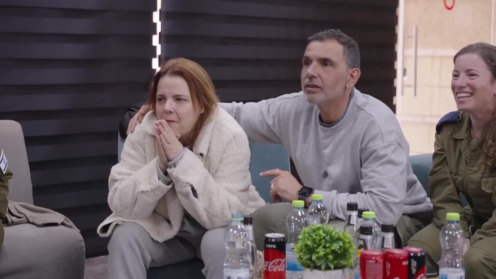 Israeli hostages' relatives in Reim base cheer while watching latest ...