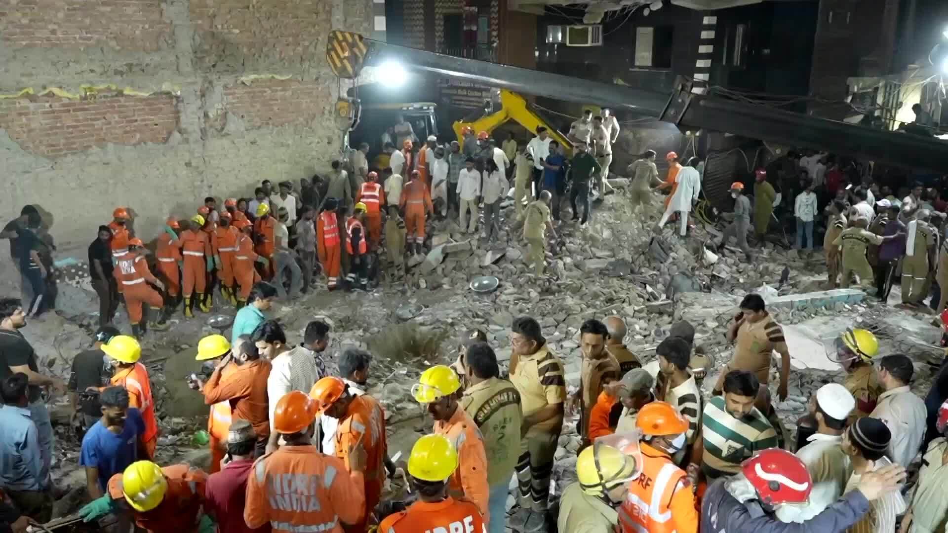 At least 11 killed in building collapse in Delhi as recovery efforts ...