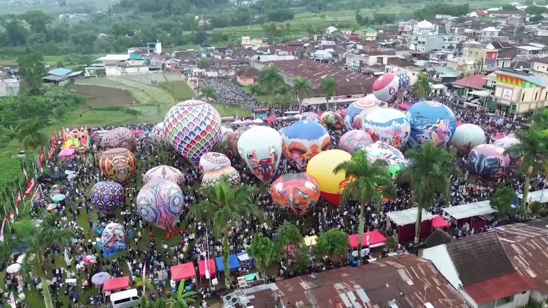Sky symphony: Colourful hot air balloons illuminate Indonesia's Eid ...