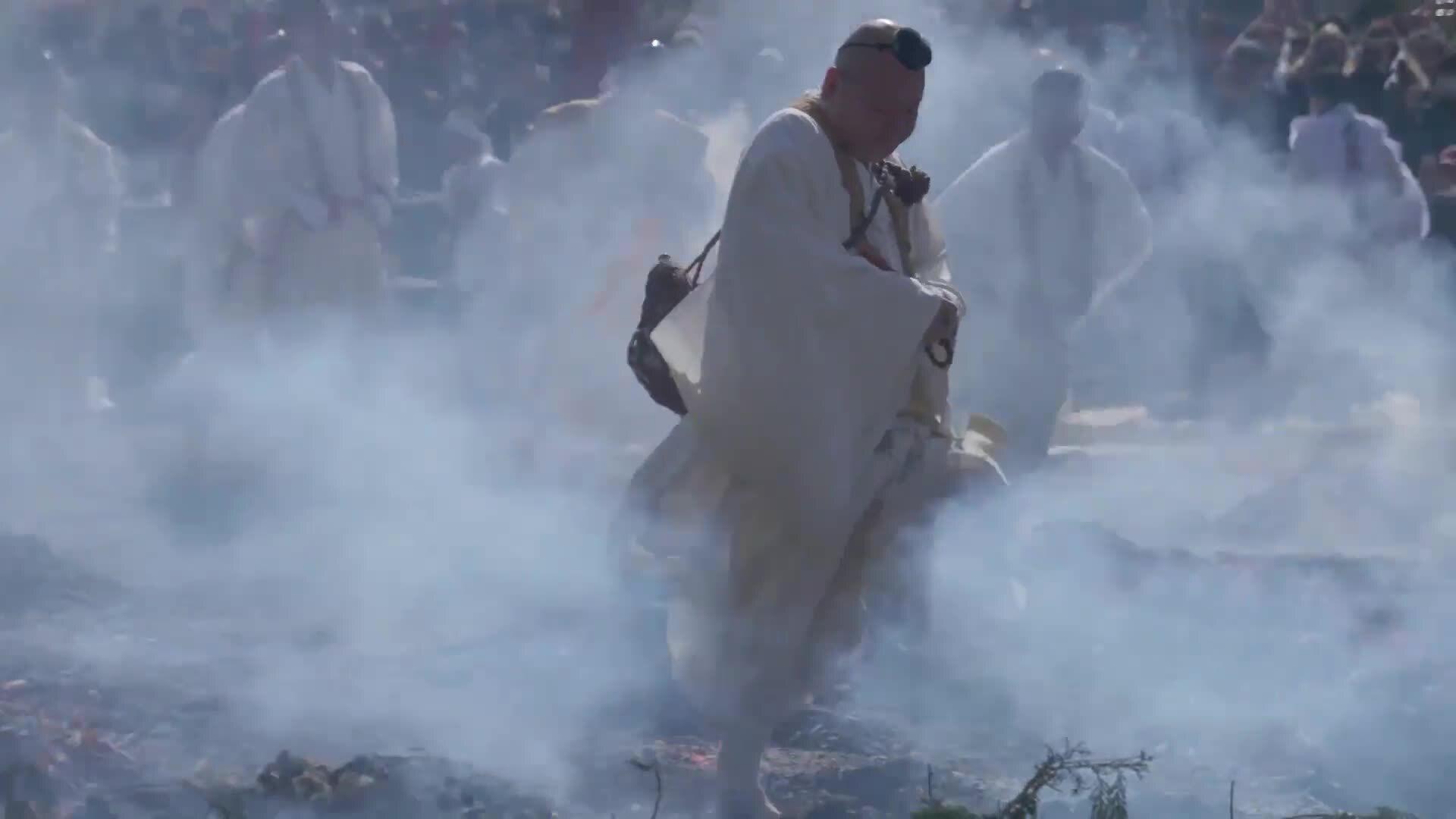 Walking on fire! Buddhist monks turn up heat for world peace at ...