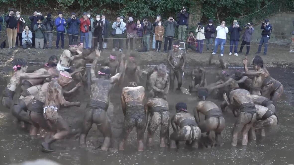 Fighting dirty! Mud wrestling at Japan's Mimusubi Shrine as locals pray ...