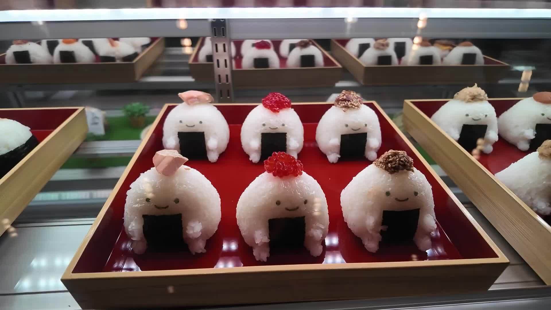 From plain to playful! New Tokyo eatery brings rice balls to life with ...
