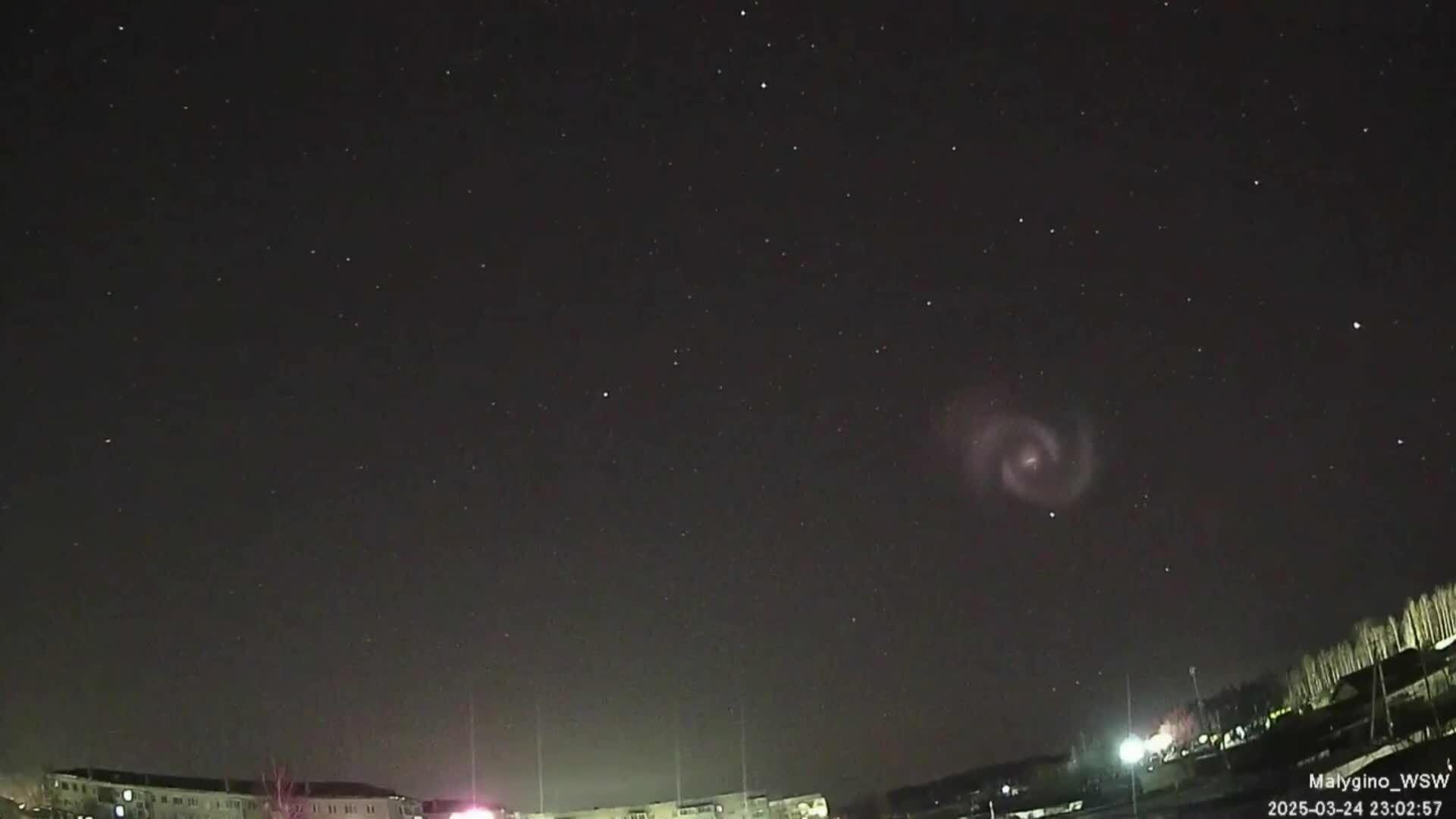 Look to the skies! Mysterious spirals light up night sky over Russia ...